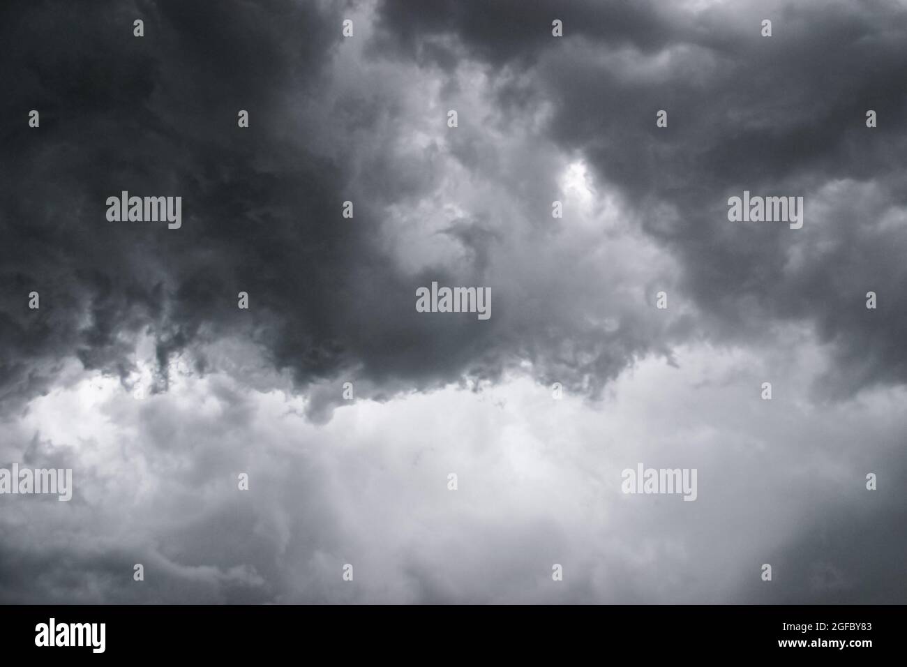 Dangerously menacing angry dark grey storm clouds Stock Photo - Alamy