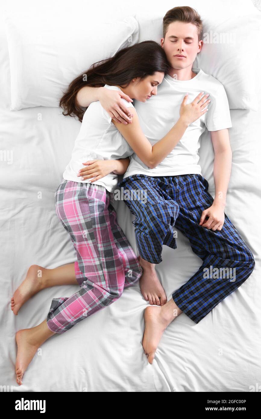 Sleeping couple, top view Stock Photo - Alamy