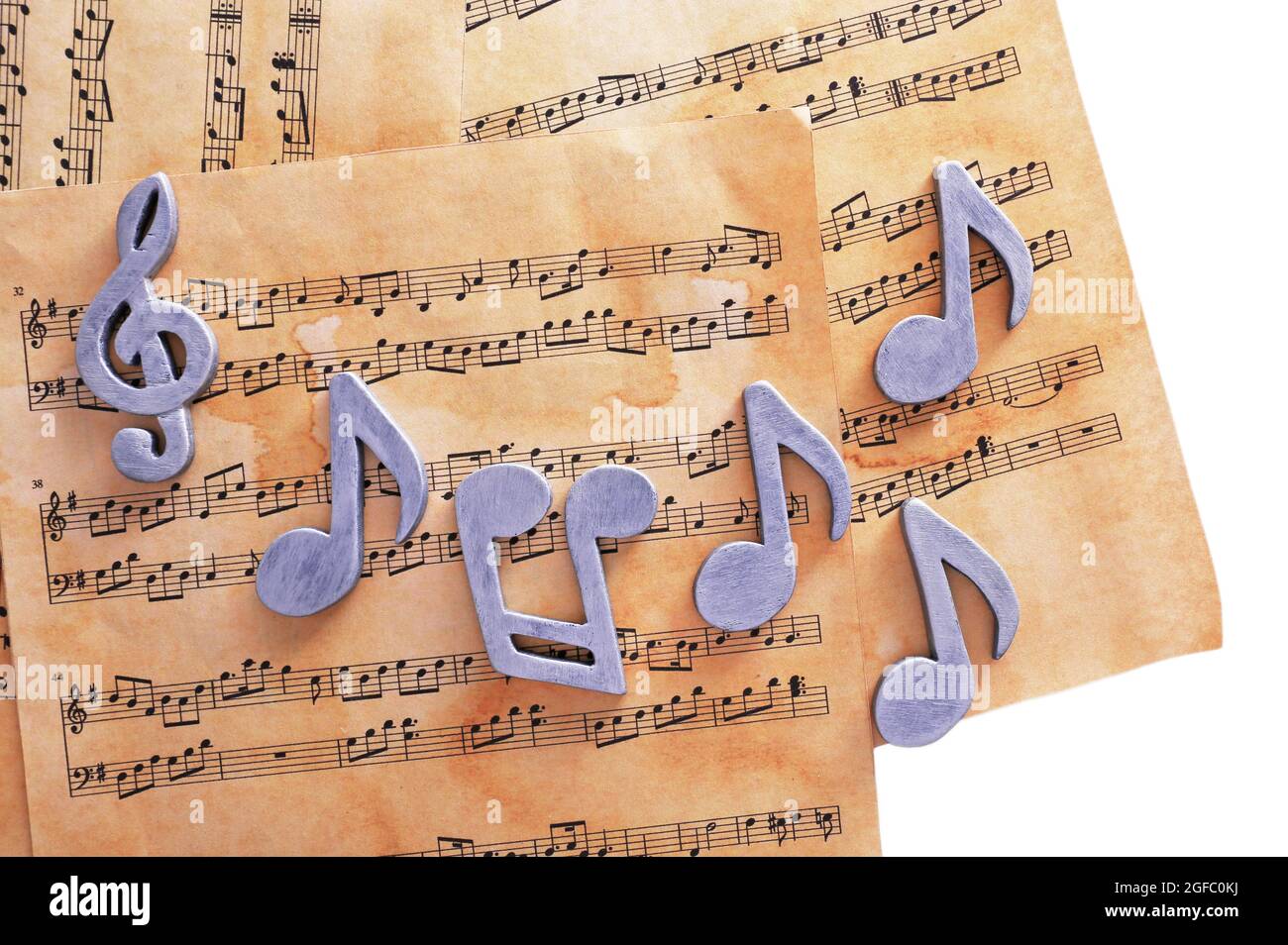 Music notes on table Stock Photo - Alamy