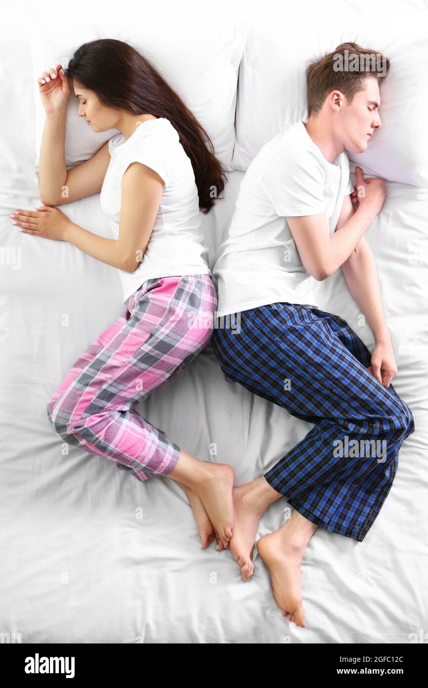 Sleeping couple, top view Stock Photo - Alamy