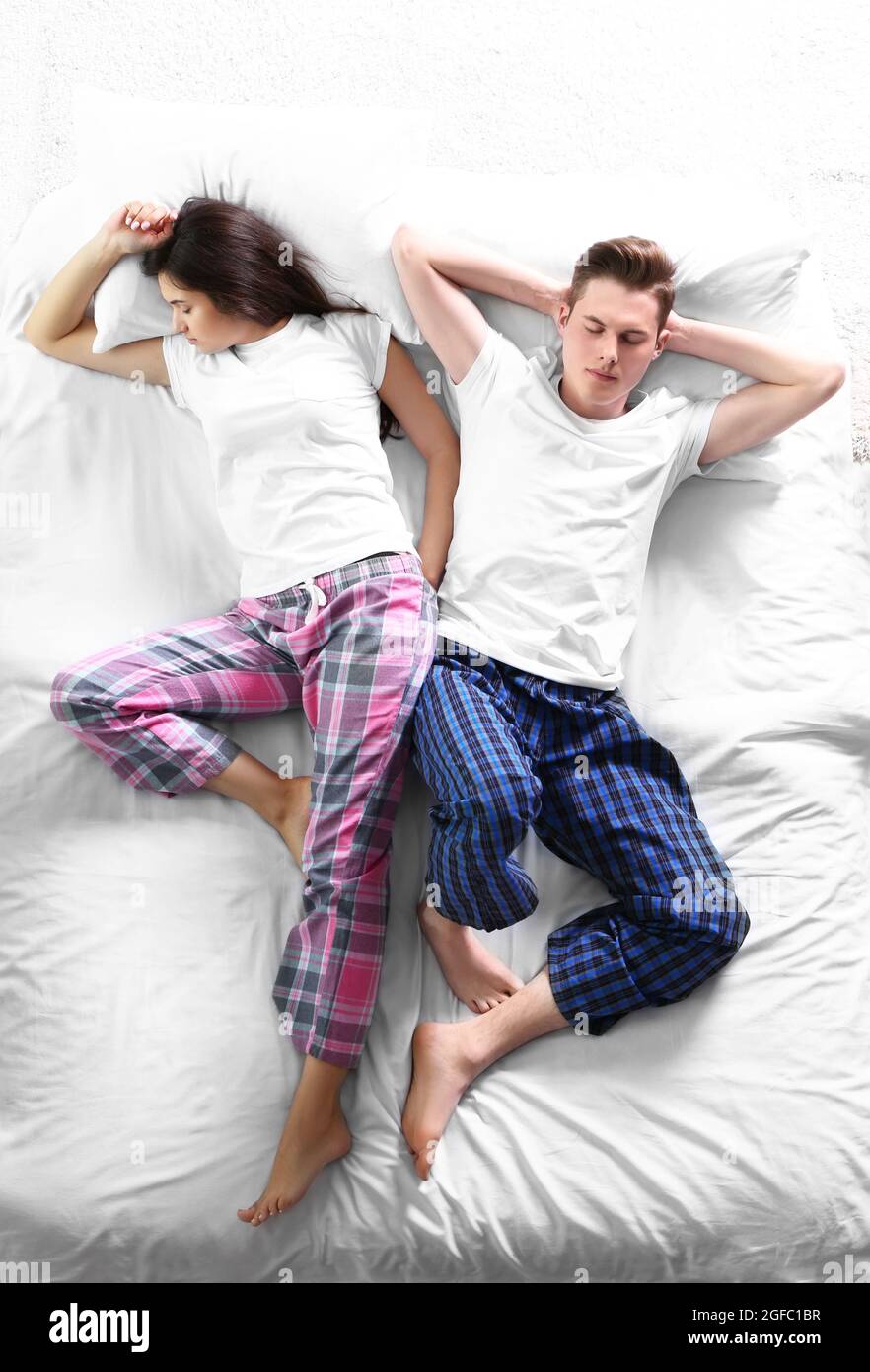 Sleeping couple, top view Stock Photo - Alamy