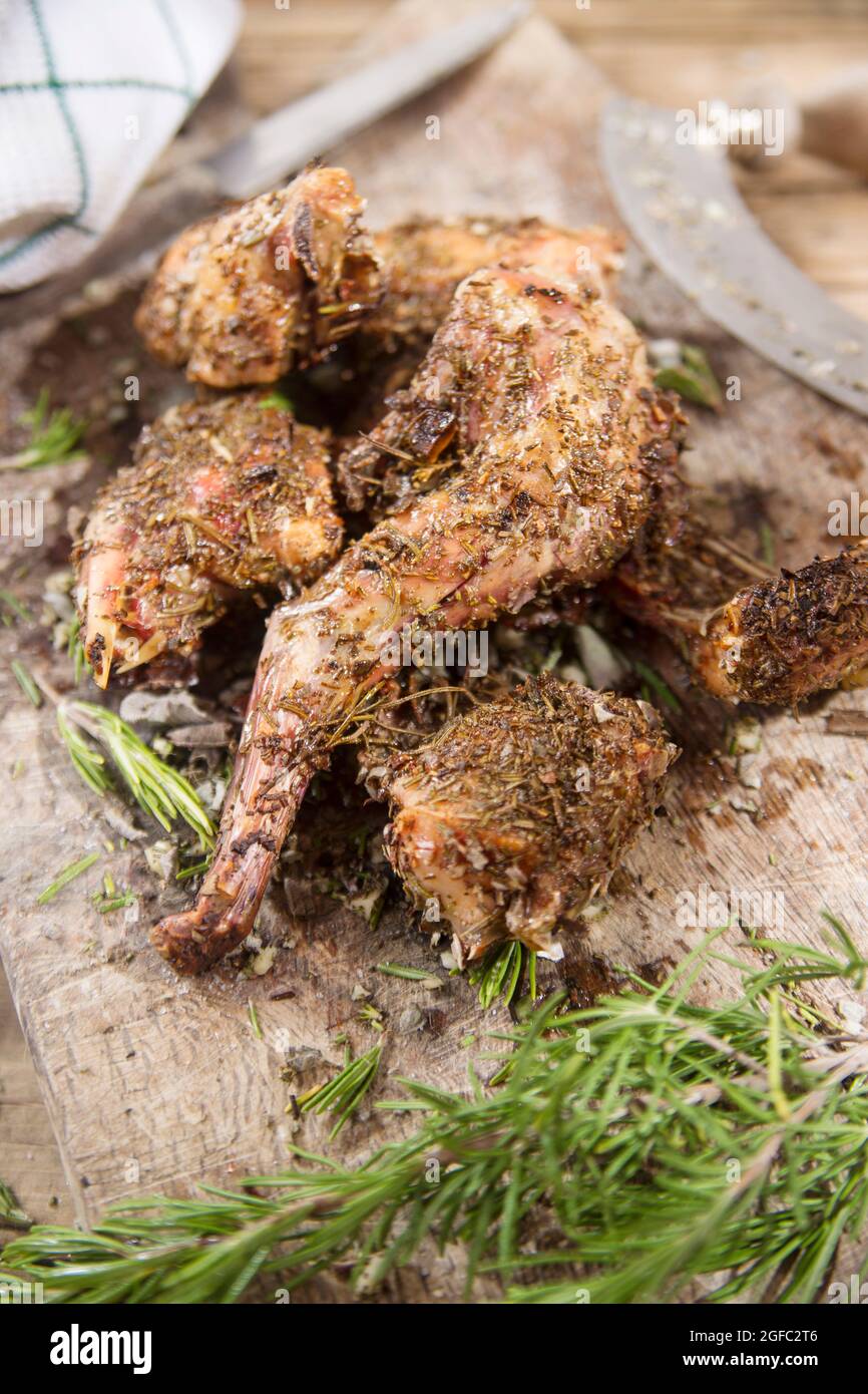 Rabbit portions prepared pickled and cooked in the oven Stock Photo - Alamy