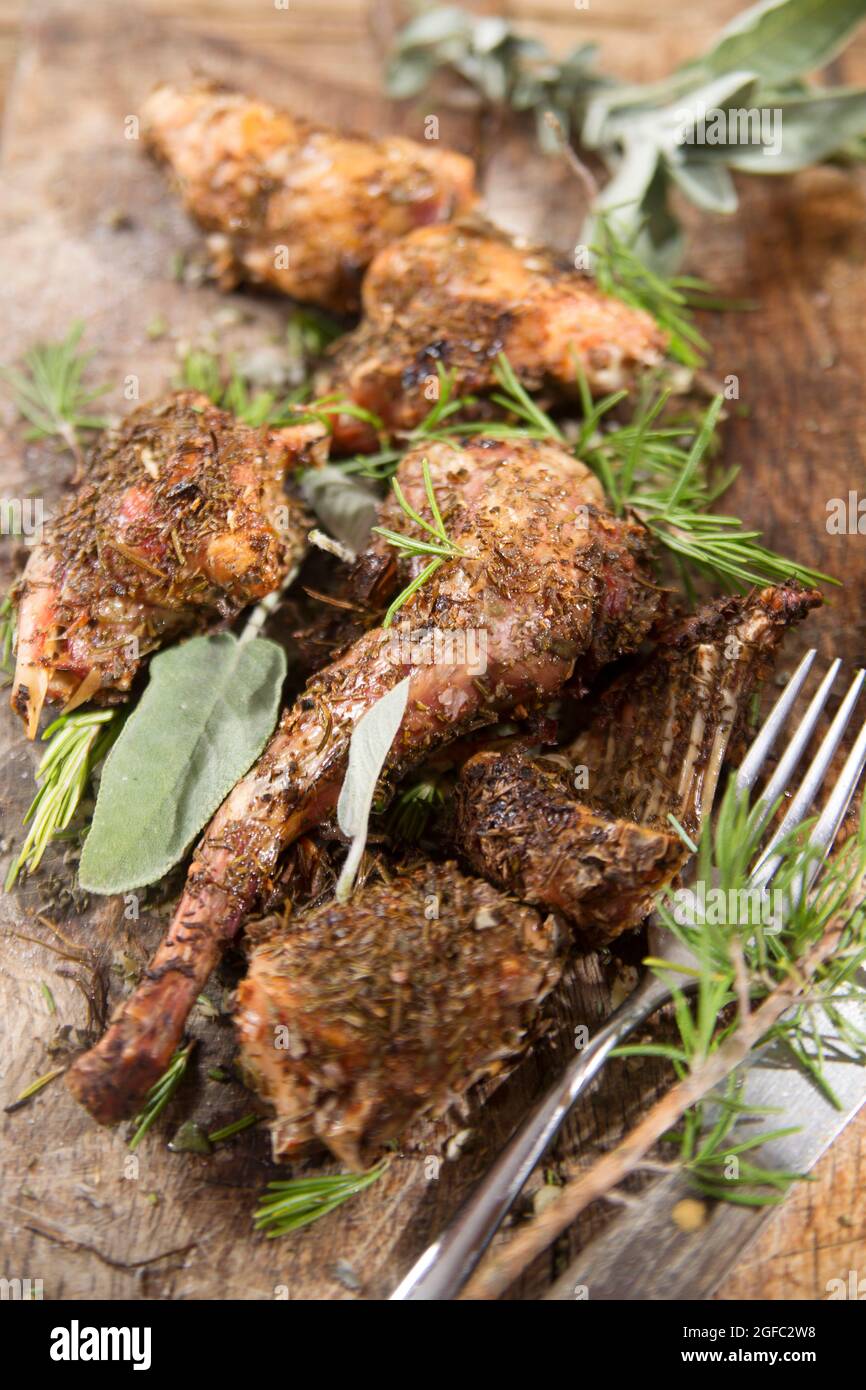 Rabbit portions prepared pickled and cooked in the oven Stock Photo - Alamy