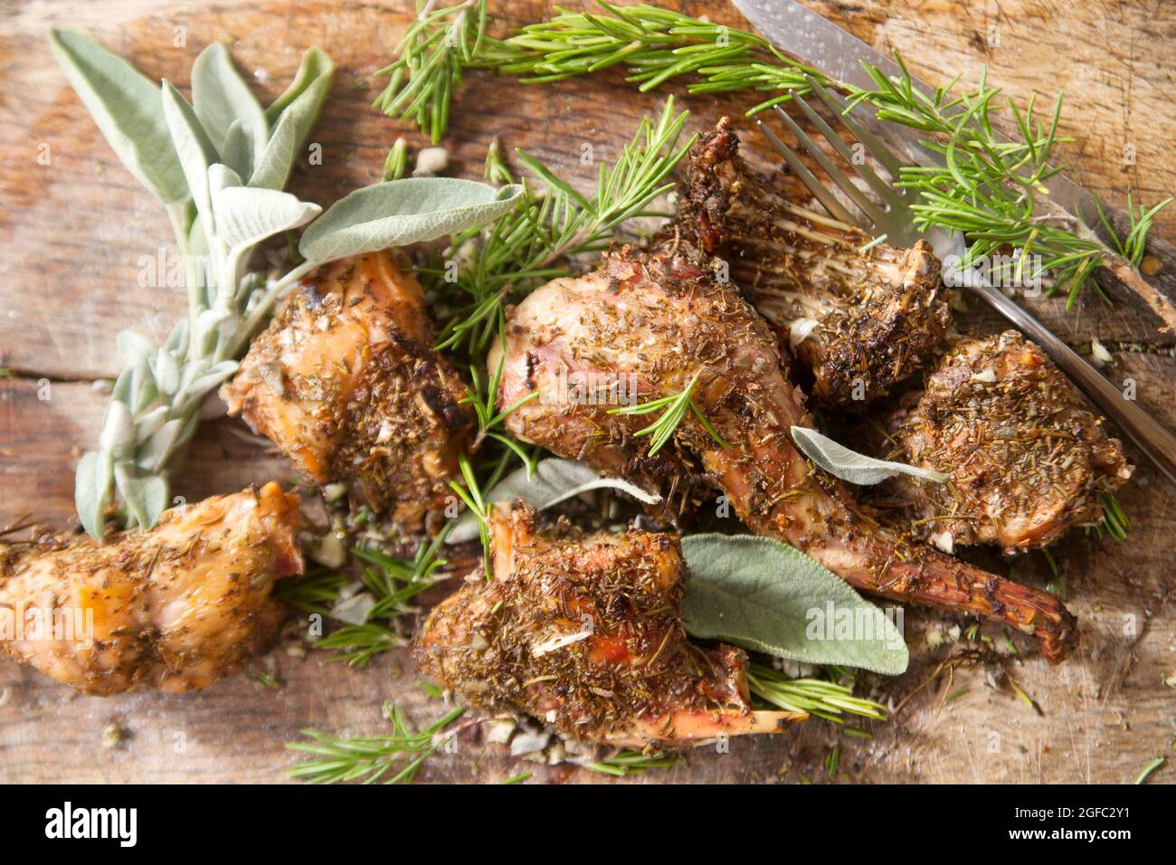 Rabbit portions prepared pickled and cooked in the oven Stock Photo - Alamy