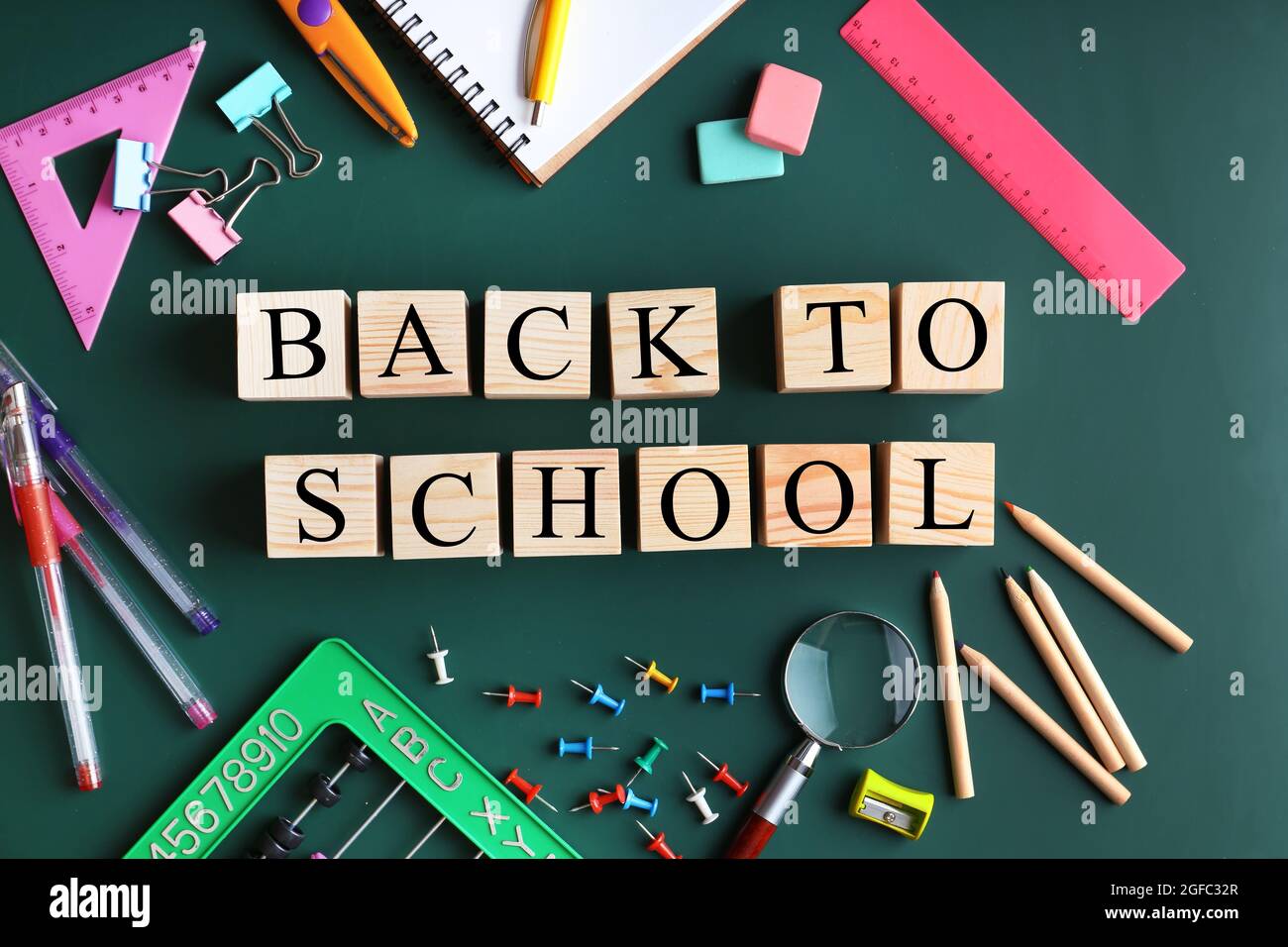 Colourful stationery and words BACK TO SCHOOL on chalkboard Stock Photo ...