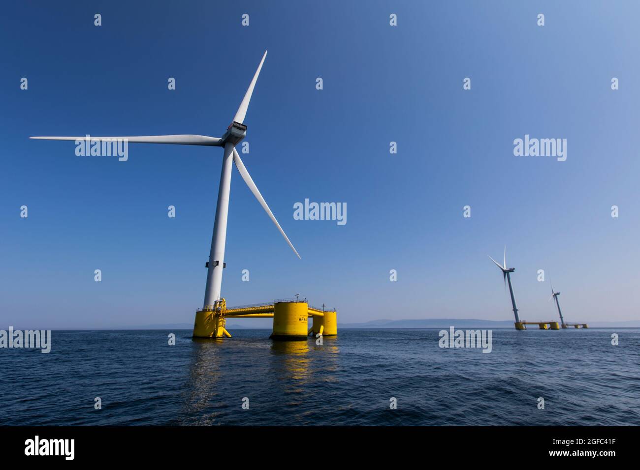 General view of the three wind turbines off the coast of Viana do ...