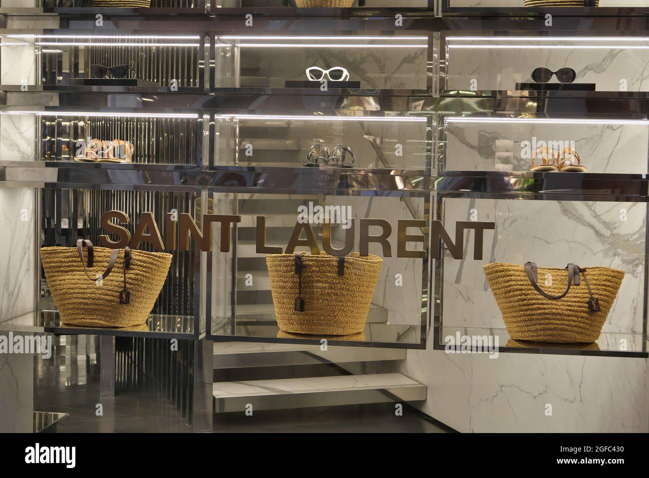 BAGS AND GLASSES ON DISPLAY AT YVES SAINT LAURENT FASHION BOUTIQUE ...