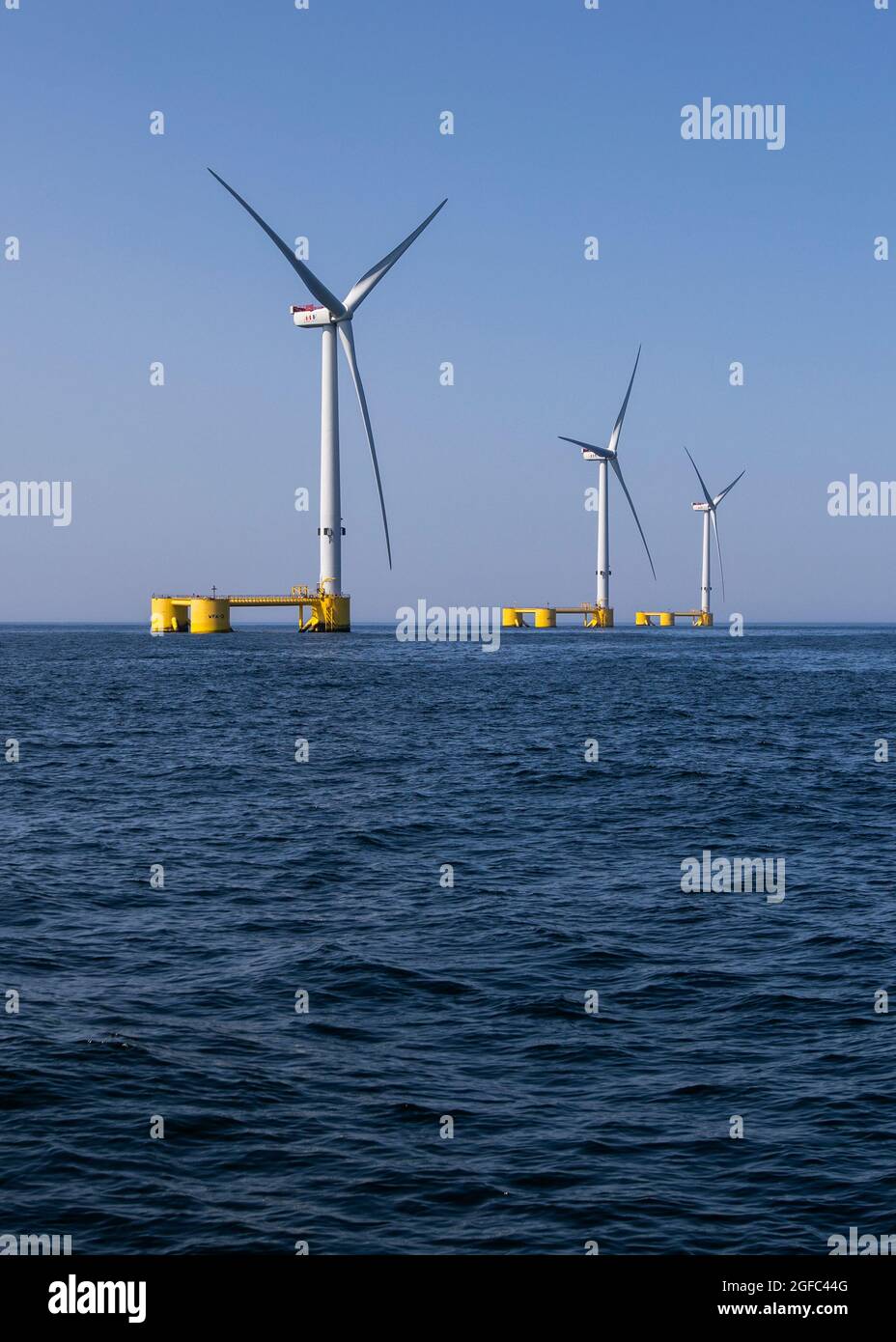 General view of the three wind turbines off the coast of Viana do ...