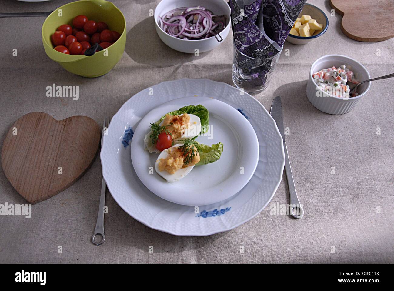 COPENHAGEN /DENMARK- Danish cold lunch table with white bread and eggs ...