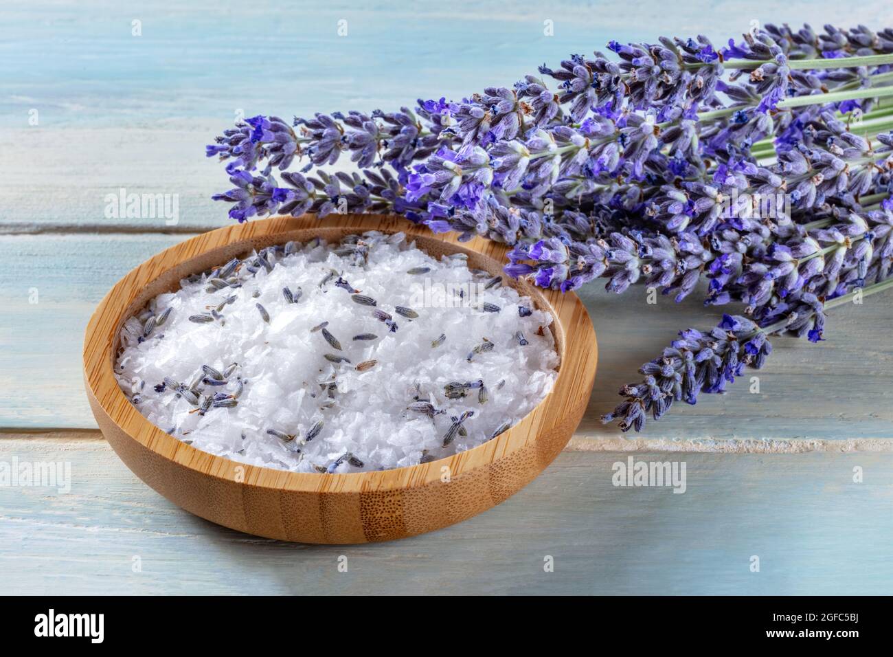 Lavender sea salt with a bunch of lavandula flowers, aromatic herb for ...