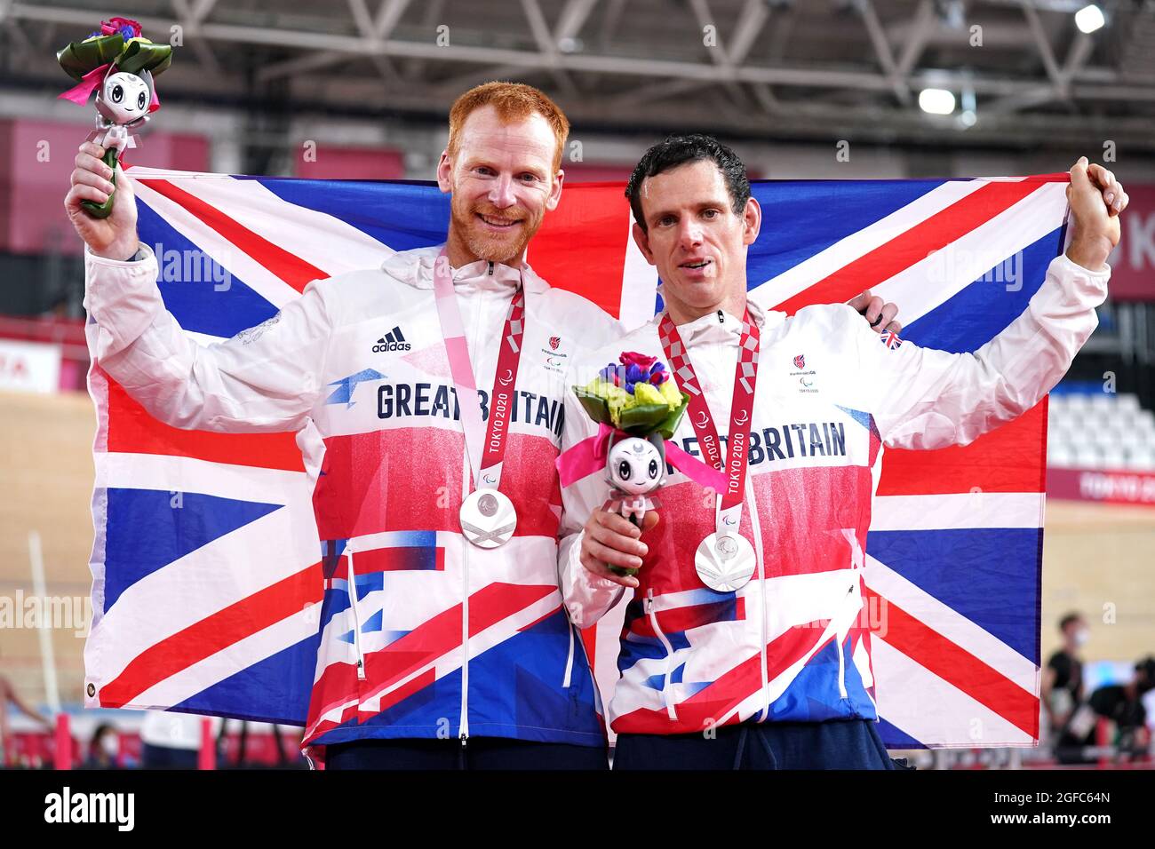 Great Britain's Stephen Bate (left) and pilot Adam Duggleby celebrate ...