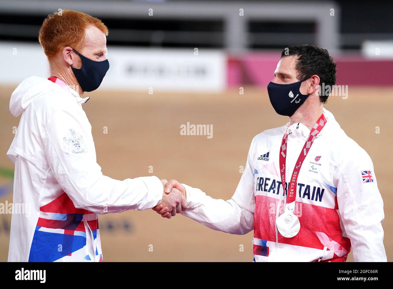 Great Britain's Stephen Bate (left) and pilot Adam Duggleby celebrate ...