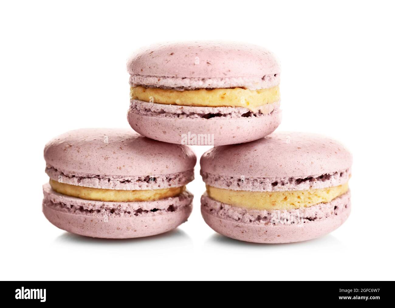 Tasty color macarons isolated on white Stock Photo - Alamy