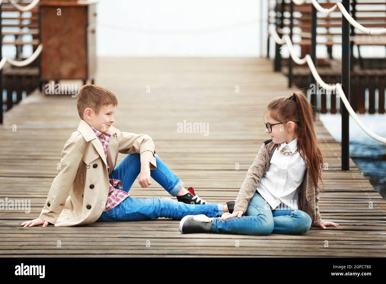 Little kids wearing stylish clothes outdoors. Fashion kid concept Stock ...