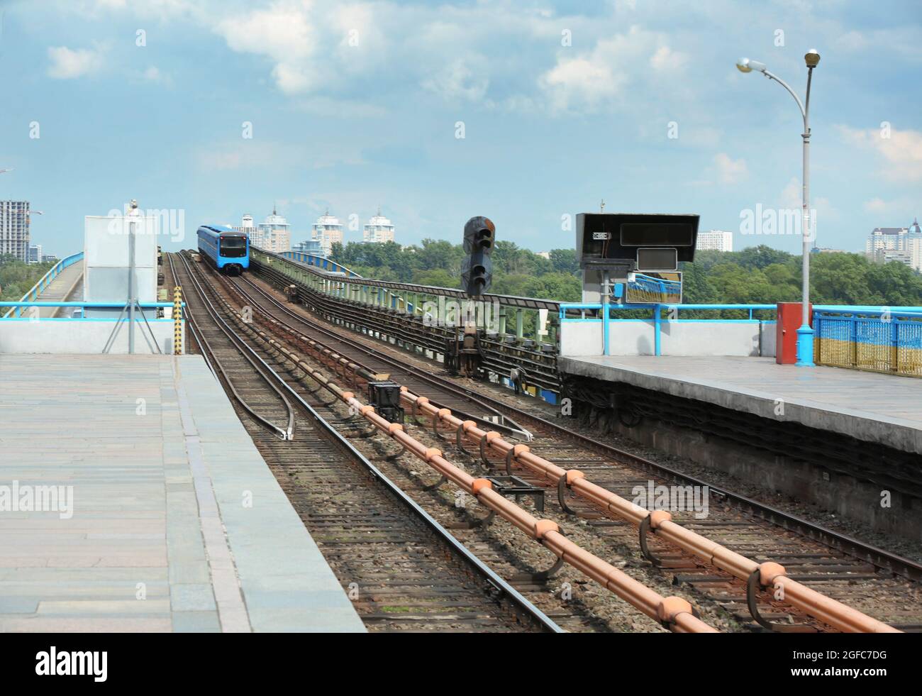 Modern bridge with subway train Stock Photo - Alamy