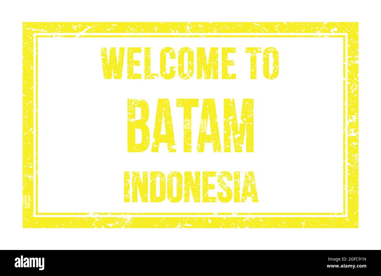 WELCOME TO BATAM - INDONESIA, words written on yellow rectangle post ...
