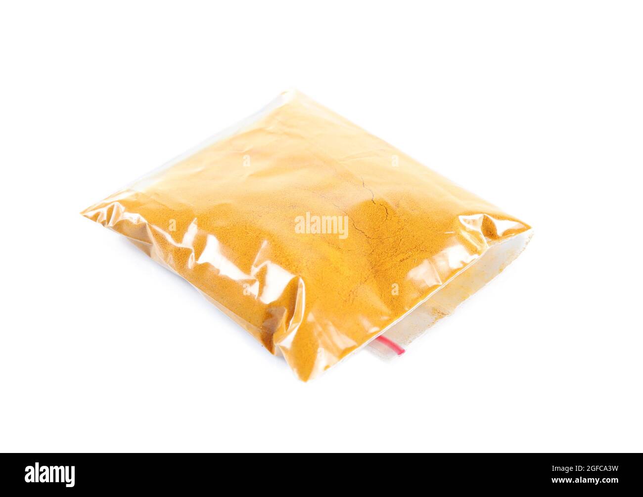 Powdered turmeric in plastic zipper bag, isolated on white Stock Photo ...