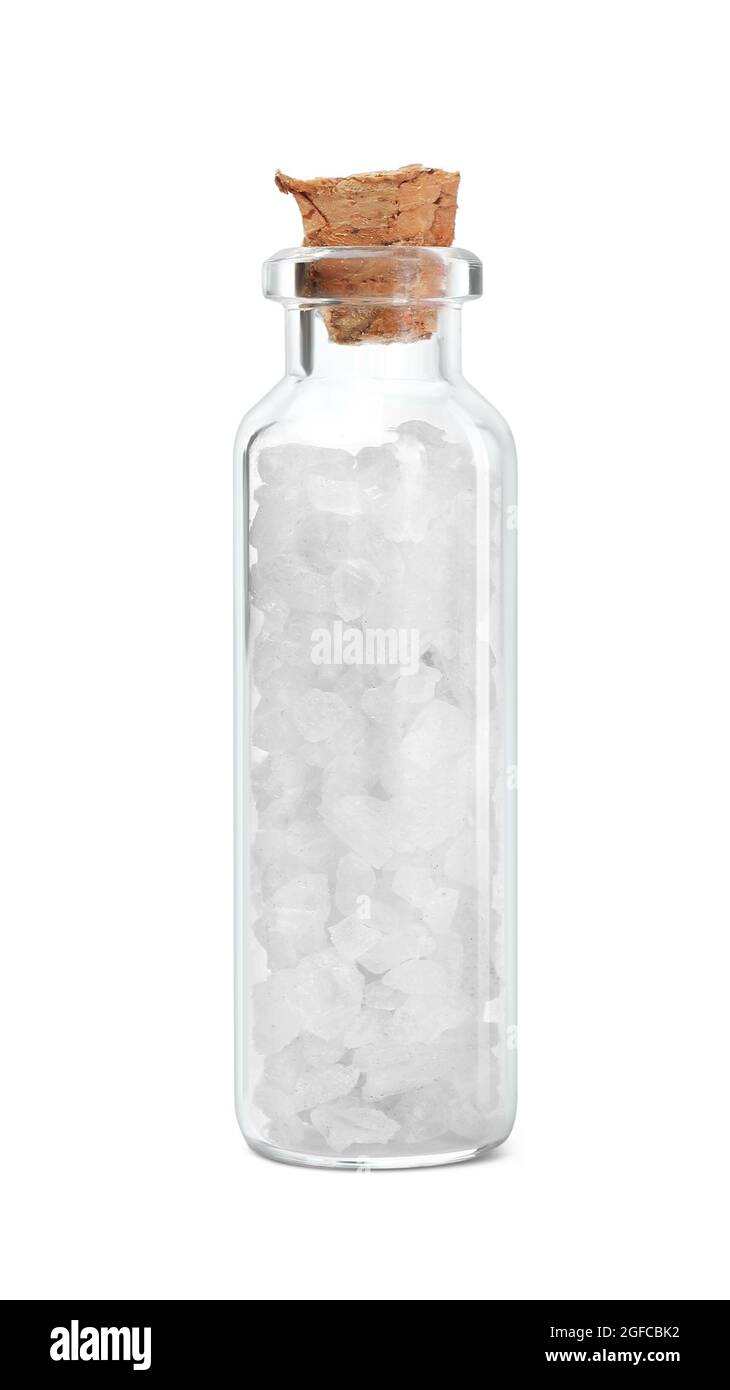 Rough salt in glass bottle on white background Stock Photo - Alamy