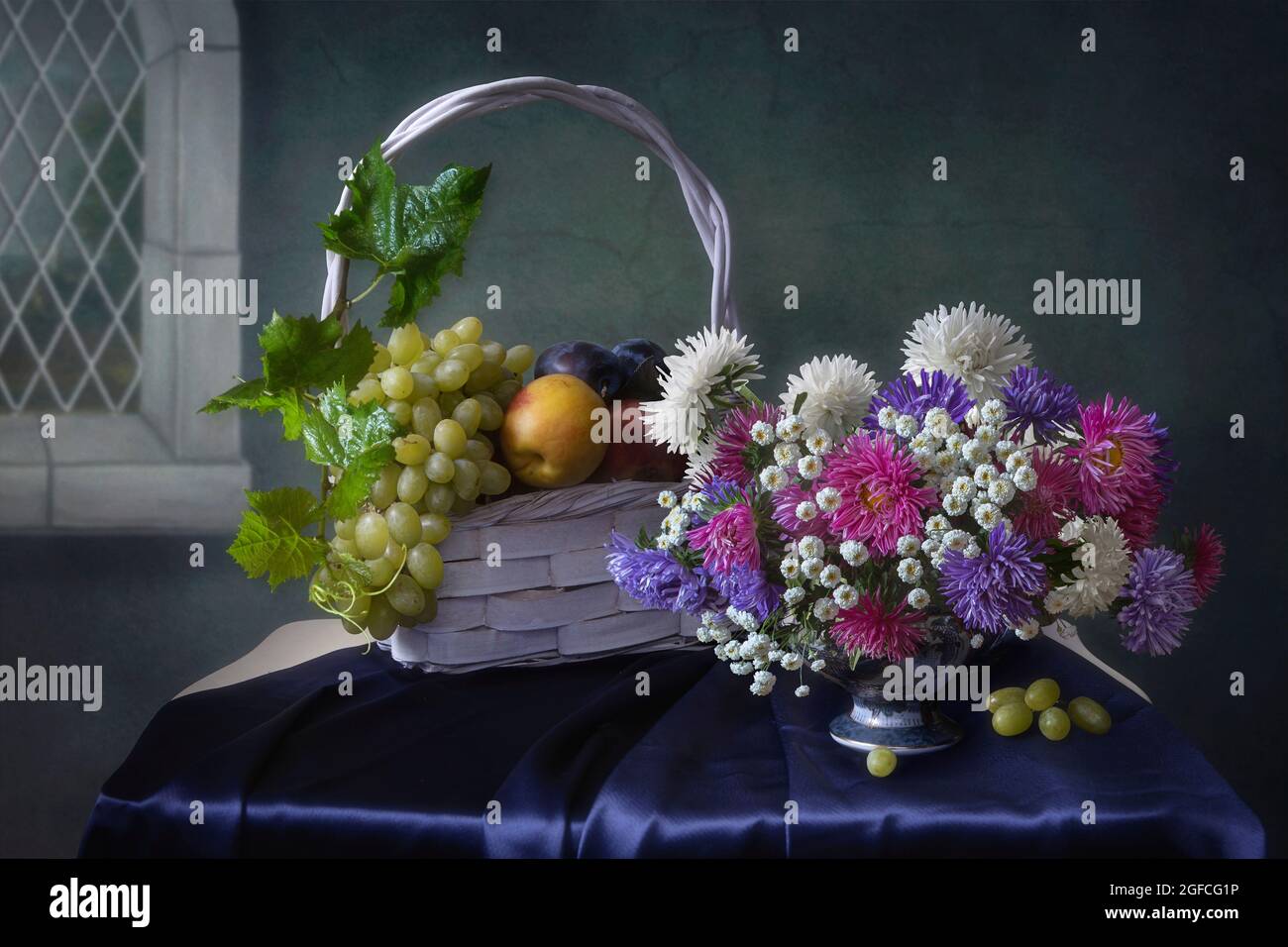 Still life with fruits and bouquet of asters Stock Photo - Alamy