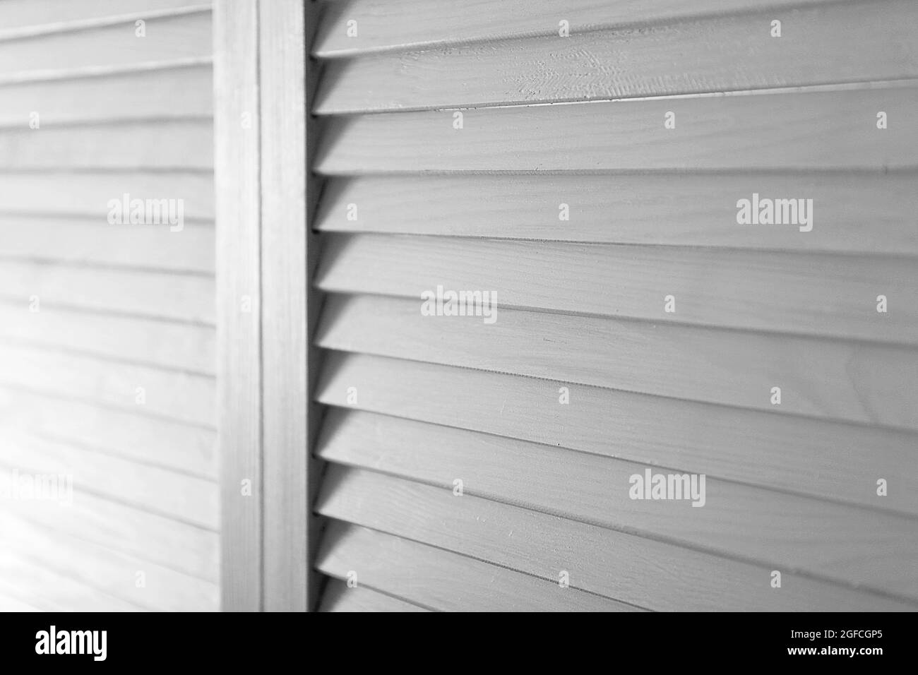 Grey folding screen, closeup Stock Photo - Alamy