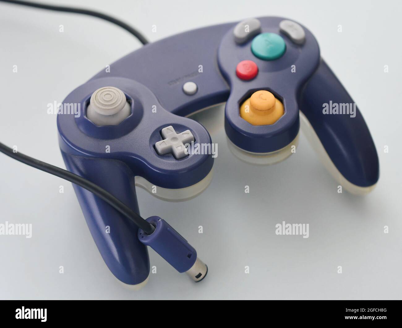 Photo of a gaming controller on white background Stock Photo - Alamy