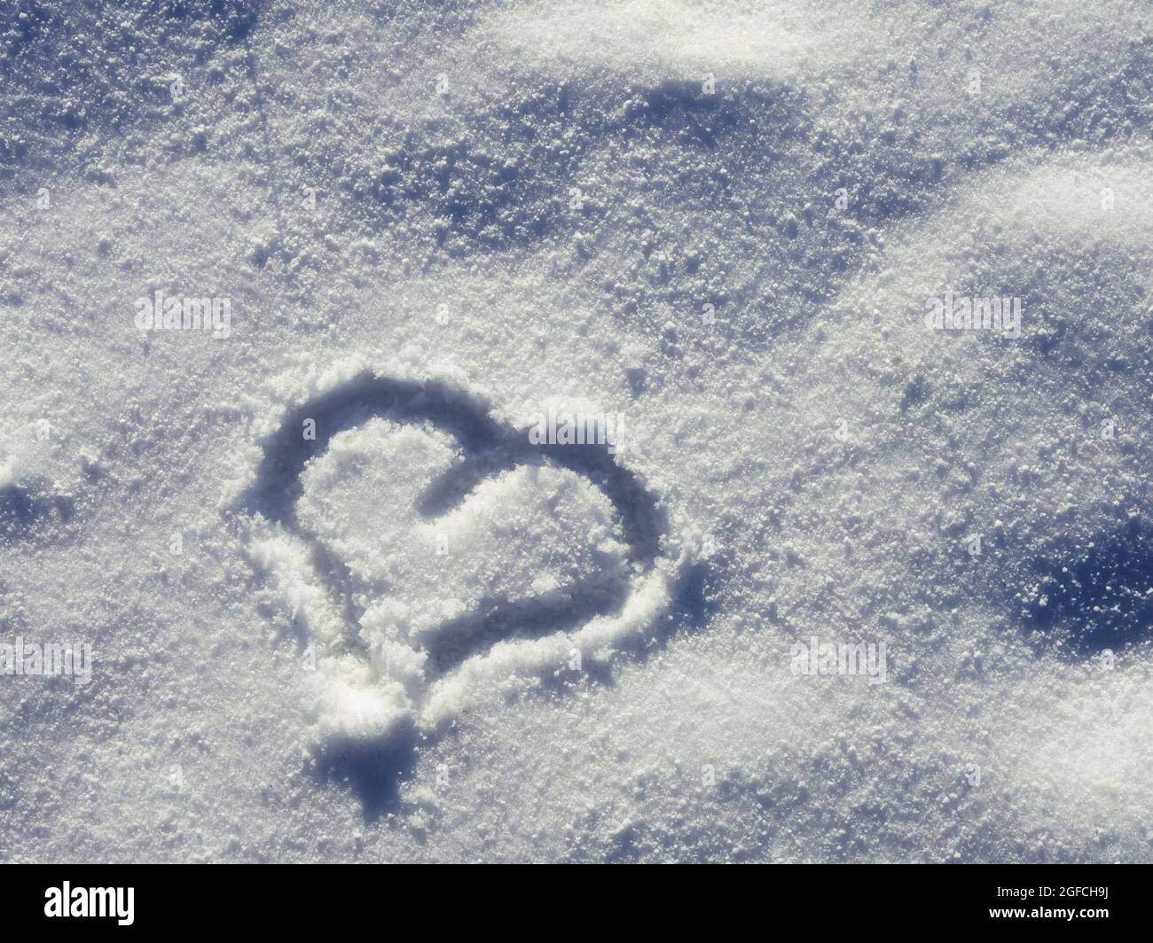Heart written snow hi-res stock photography and images - Alamy