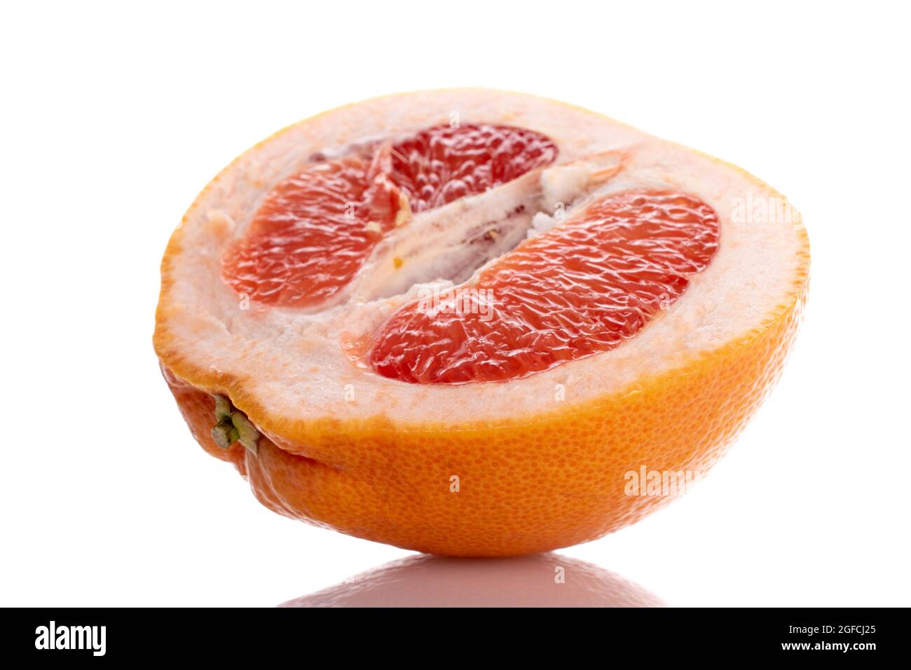 Ripe natural half of a grapefruit, close-up, isolated on white Stock ...