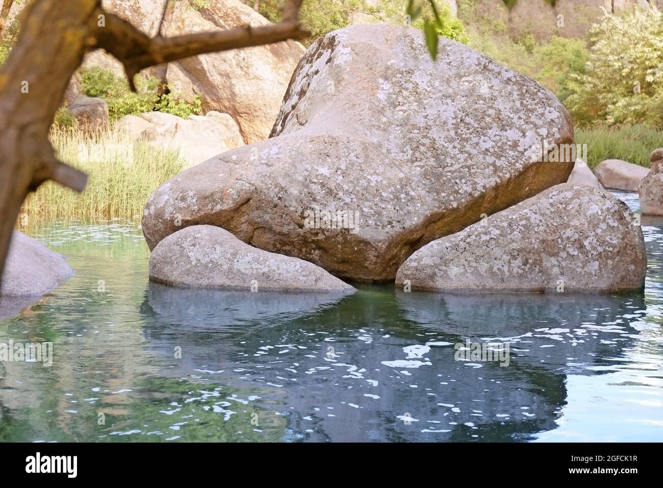 River flowing between rocks Stock Photo - Alamy