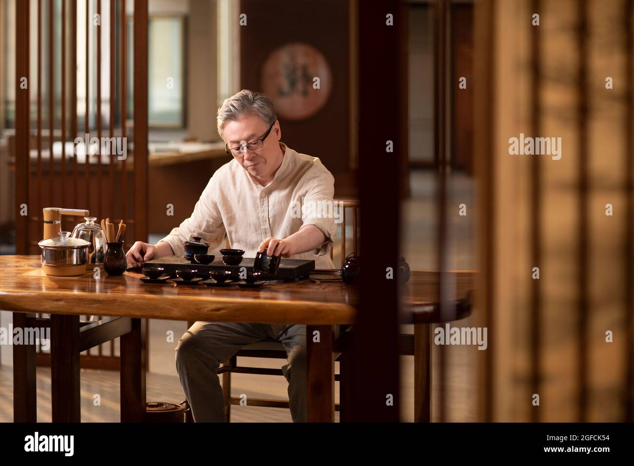 Cheerful man tea kettle hi-res stock photography and images - Alamy