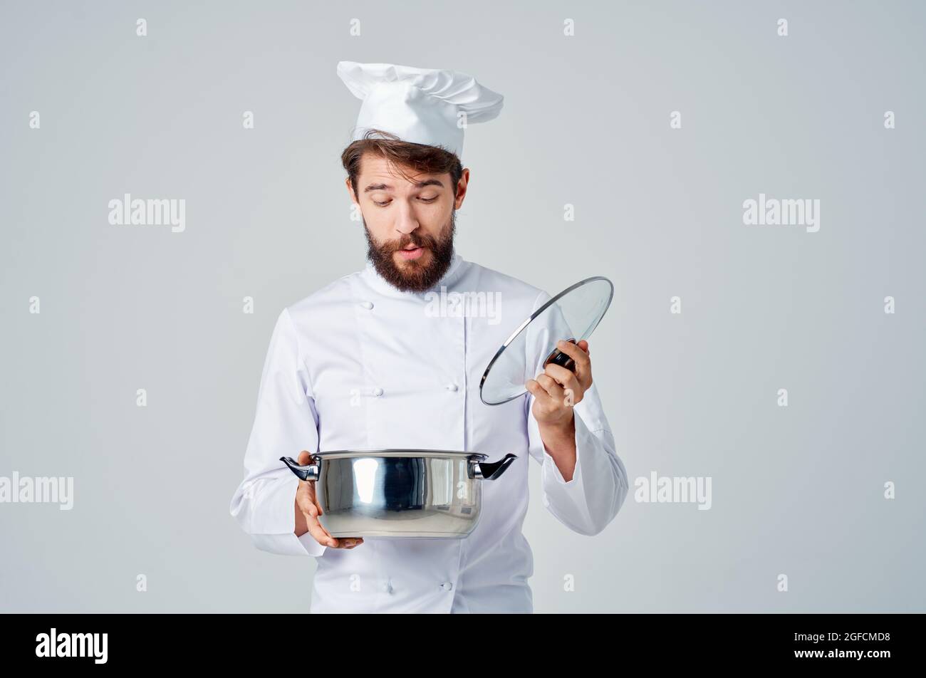 male chef with white hat on his head restaurant kitchen service Stock ...