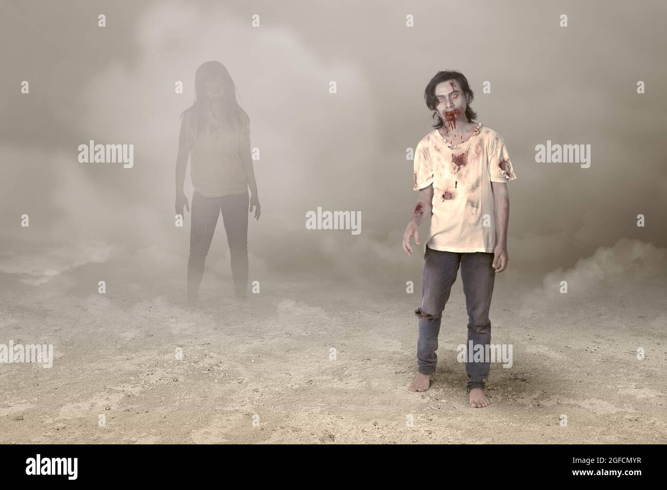 Scary zombie with blood and wound on his body walking in the fog Stock ...