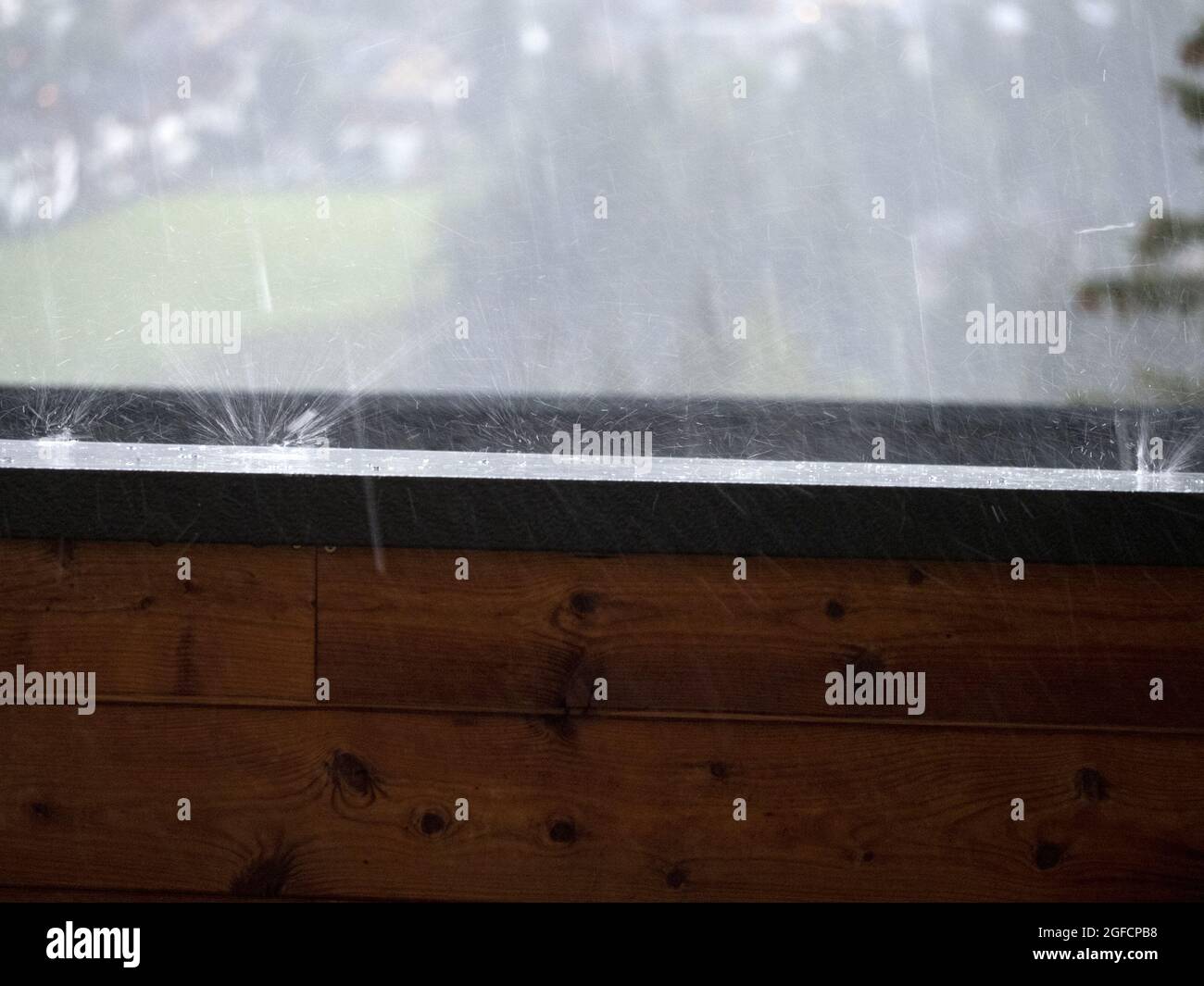 hailstorm on balcony in mountain detail of hailstones while falling ...