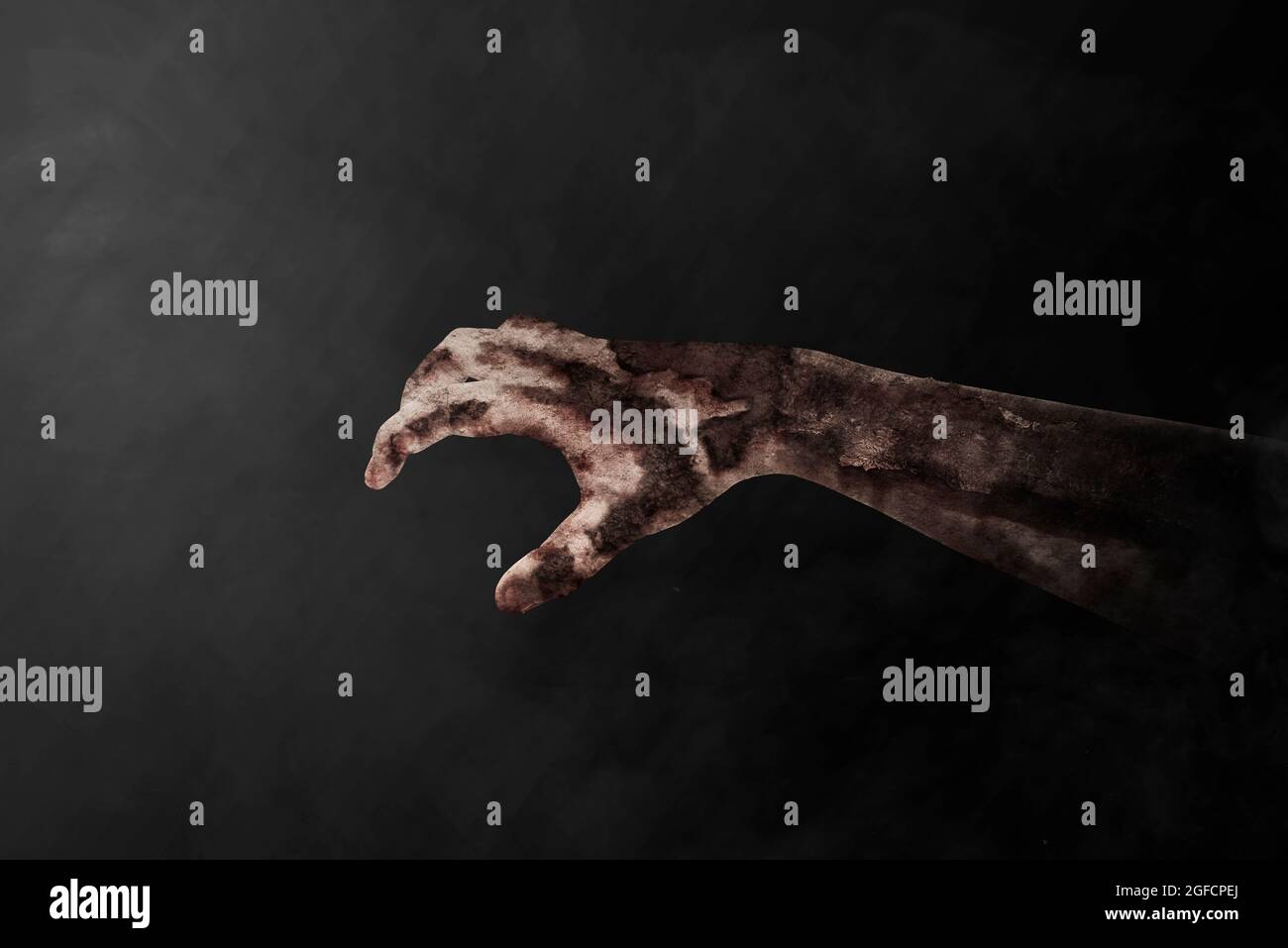 Zombie hand with blood and wound with black background Stock Photo - Alamy