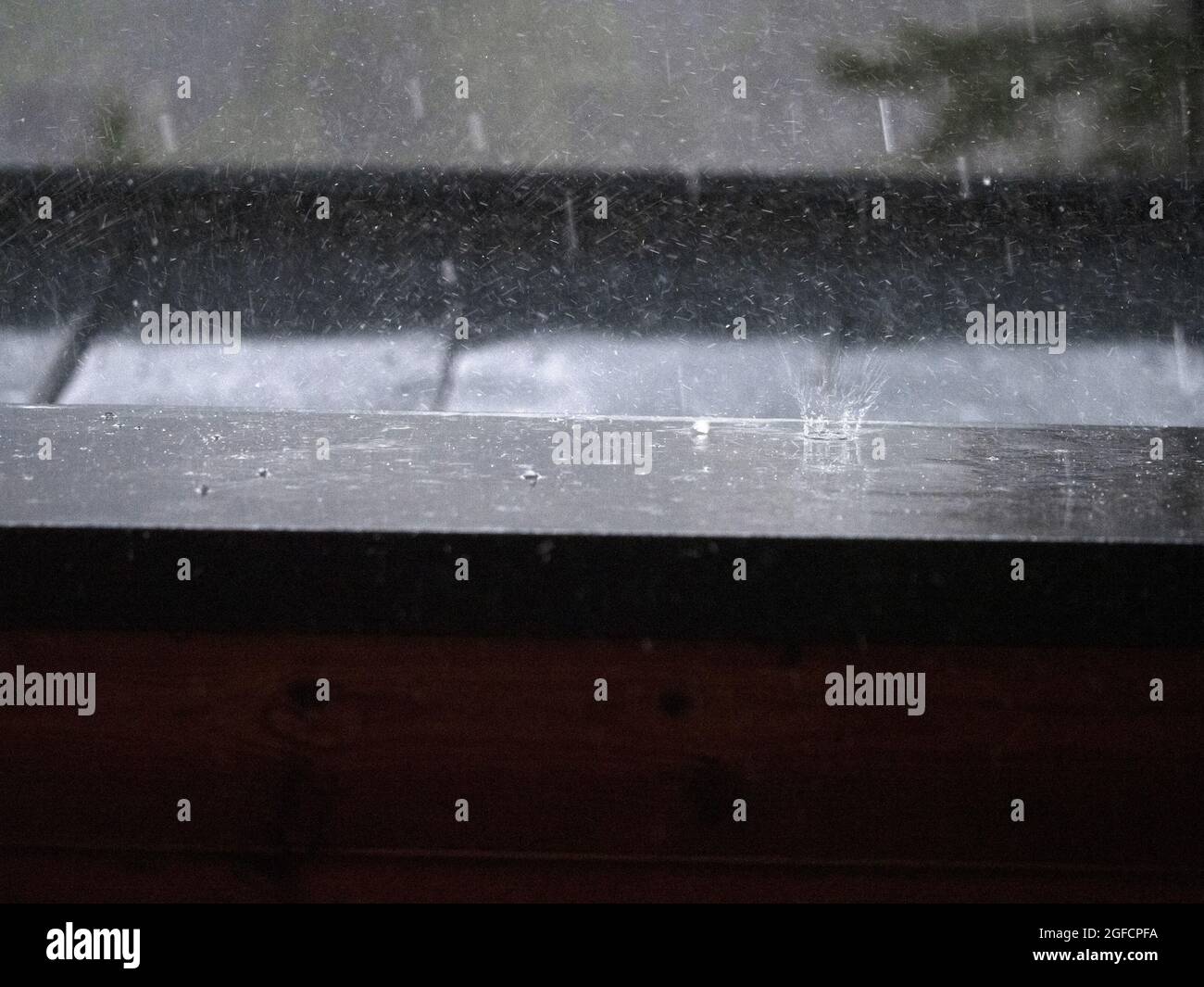 hailstorm on balcony in mountain detail of hailstones while falling ...