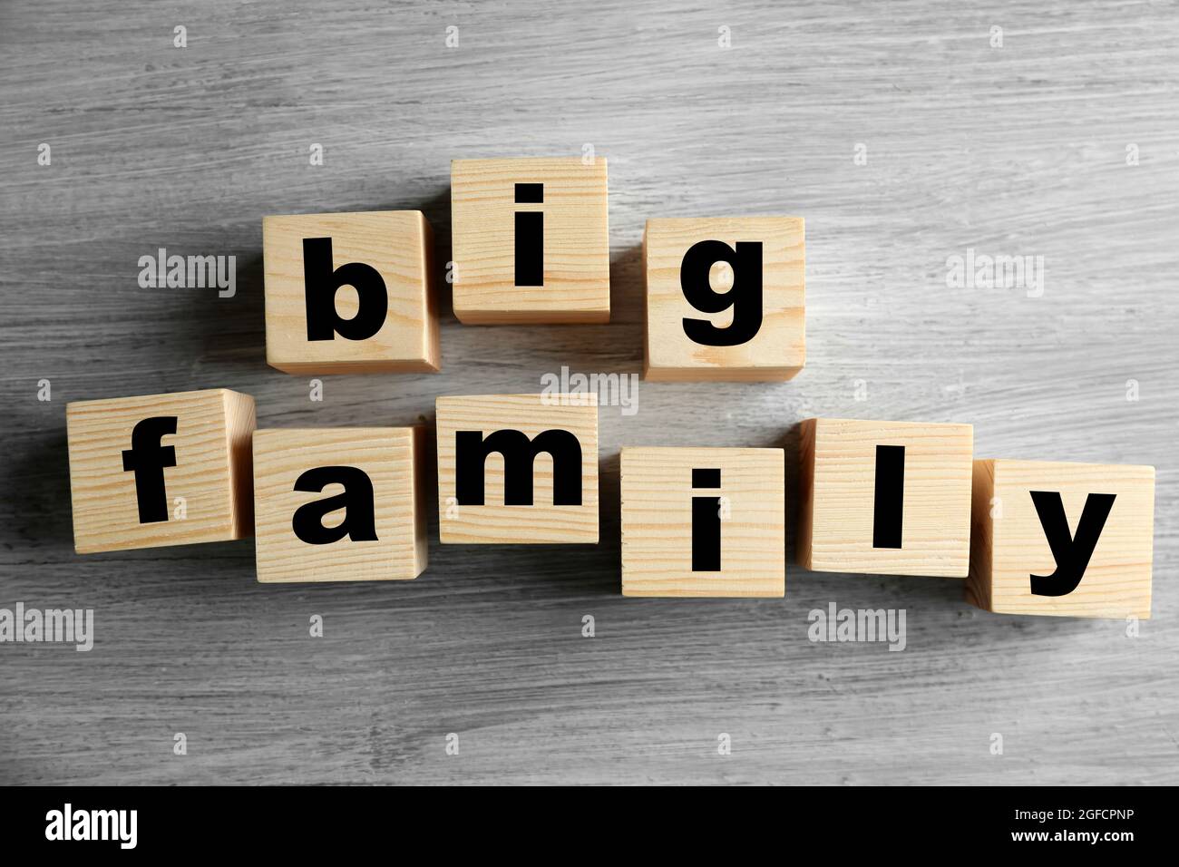 Words BIG FAMILY on light background Stock Photo - Alamy