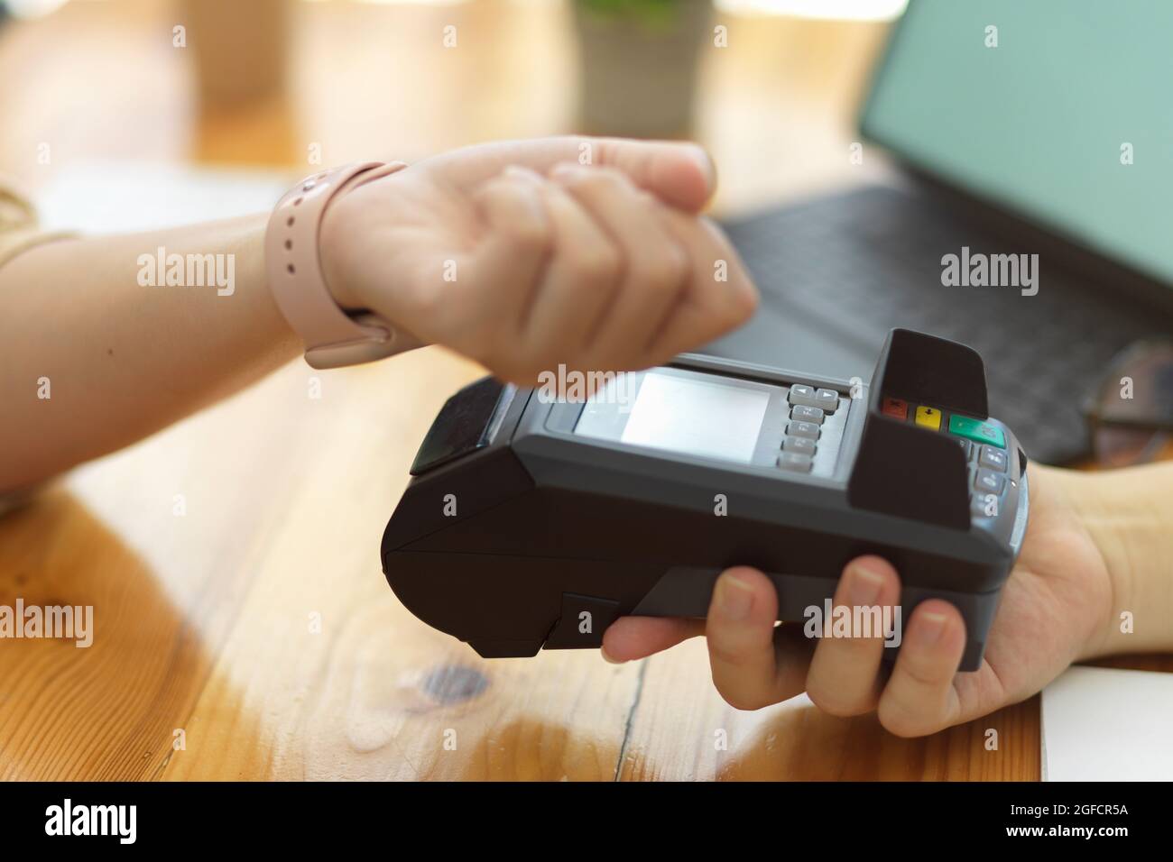 NFC technology, Female paying by digital wallet service via smart watch ...