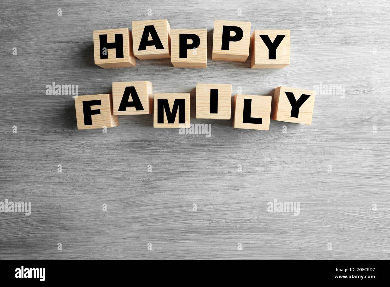 Words HAPPY FAMILY on light background Stock Photo - Alamy