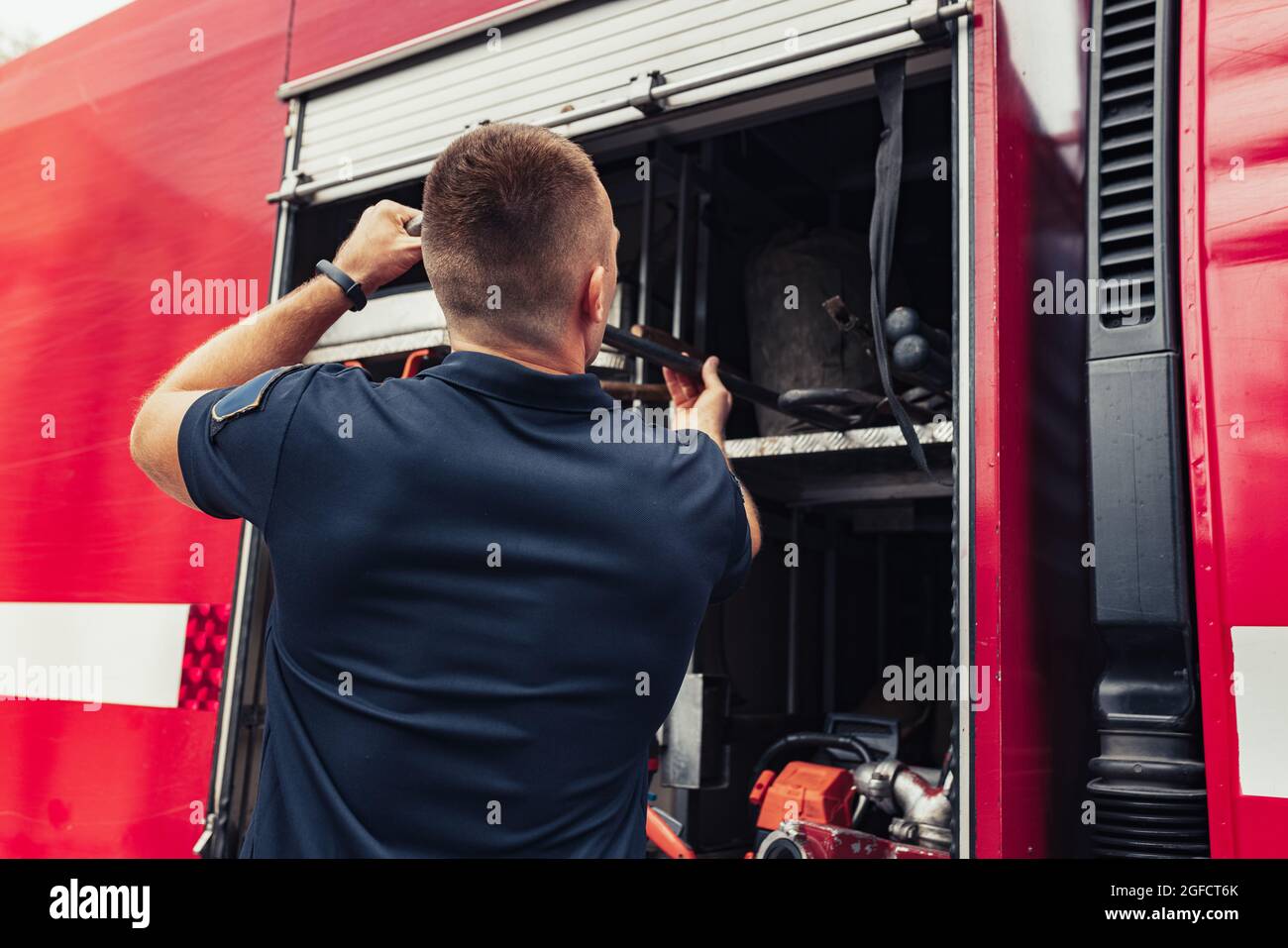 Firefighter with special instruments for ambulance firefighting Stock ...
