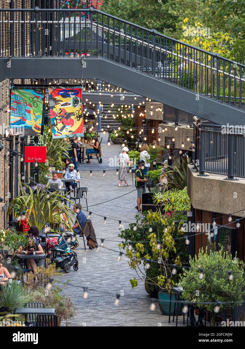 Coal Drops Yard Kings Cross London - shoppers and diners on the lower ...