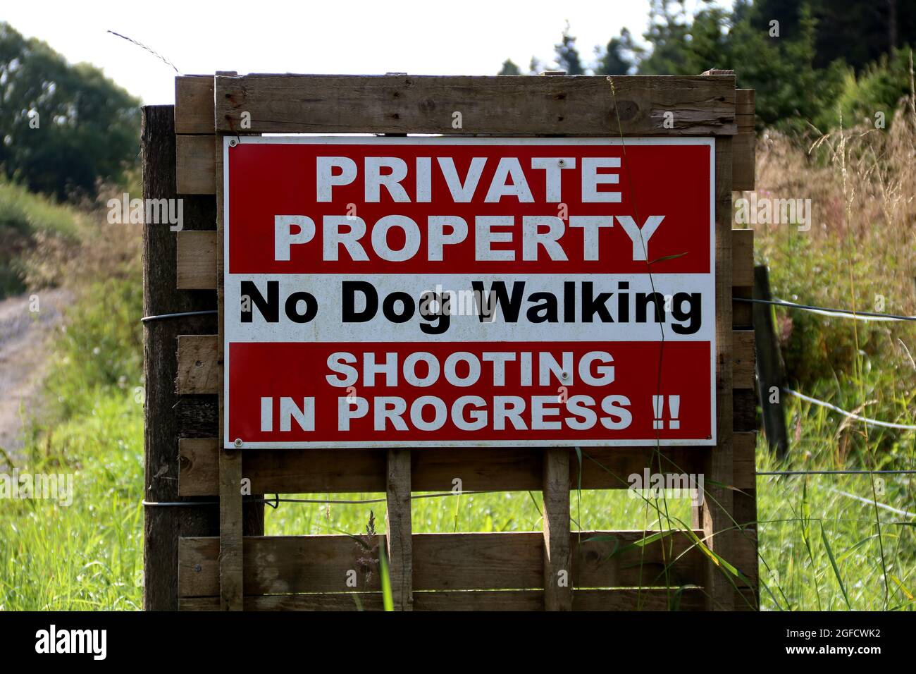 Shooting in progress warning sign in a country estate Stock Photo - Alamy