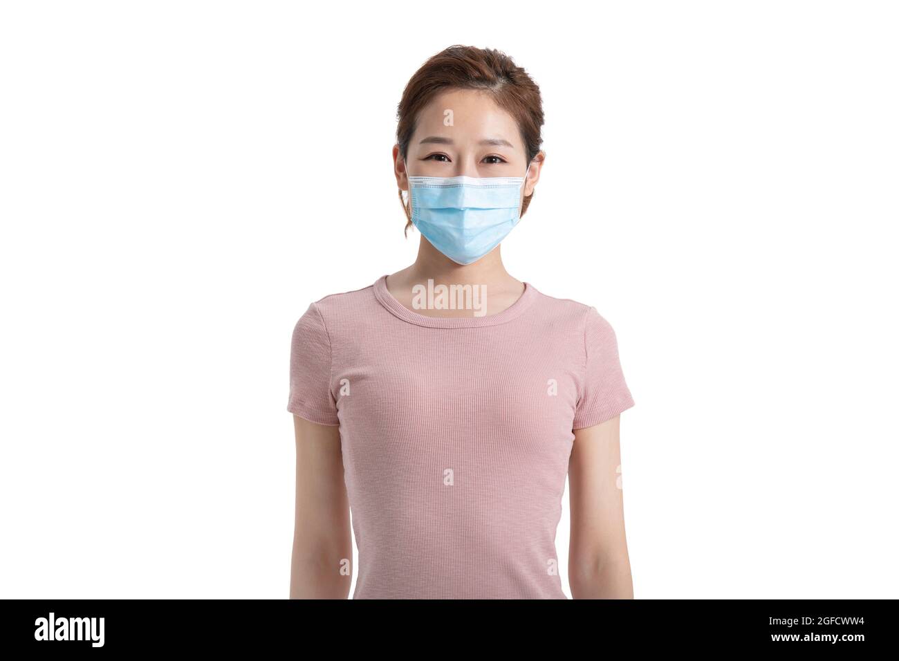 Young woman wearing surgical mask Stock Photo - Alamy