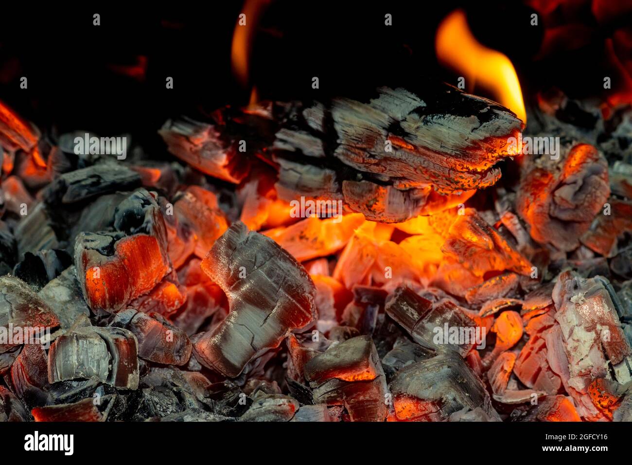 Background of red and black burning coals close-up for design Stock ...