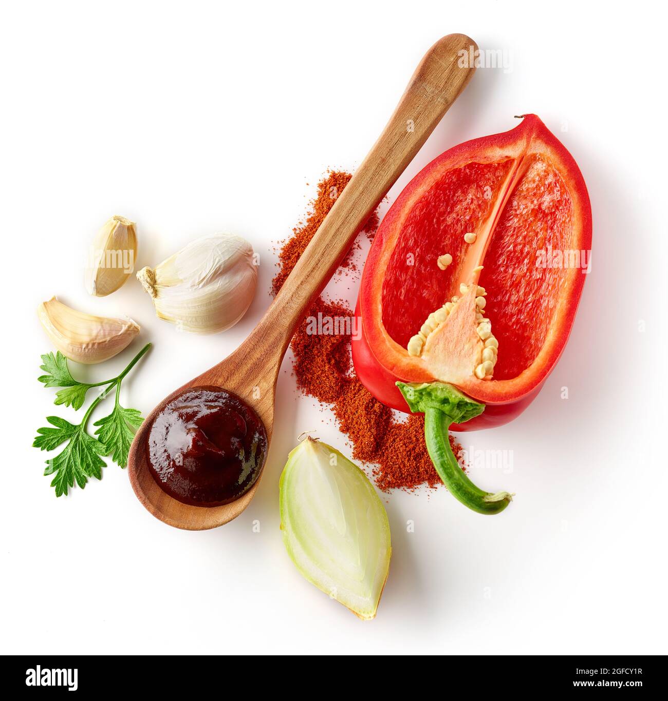 Set of spices - wooden spoon with barbecue sauce, red bell pepper ...