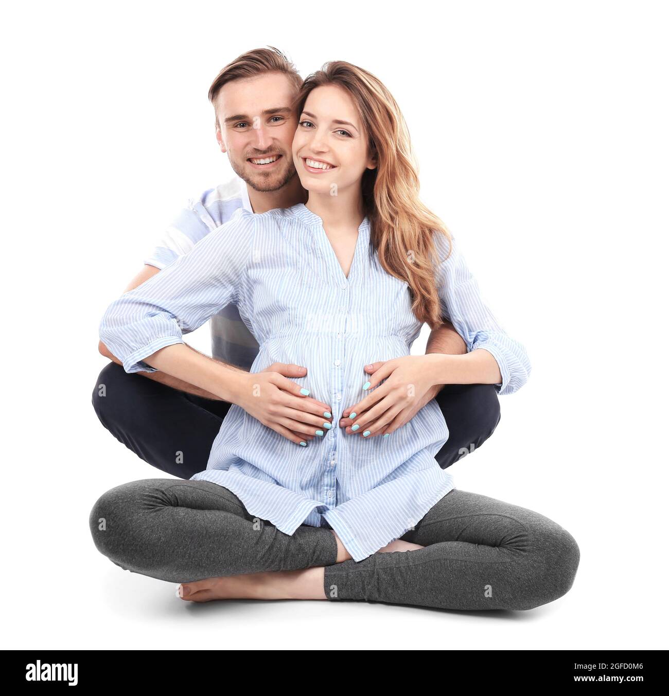 Happy family expecting baby isolated on white Stock Photo - Alamy