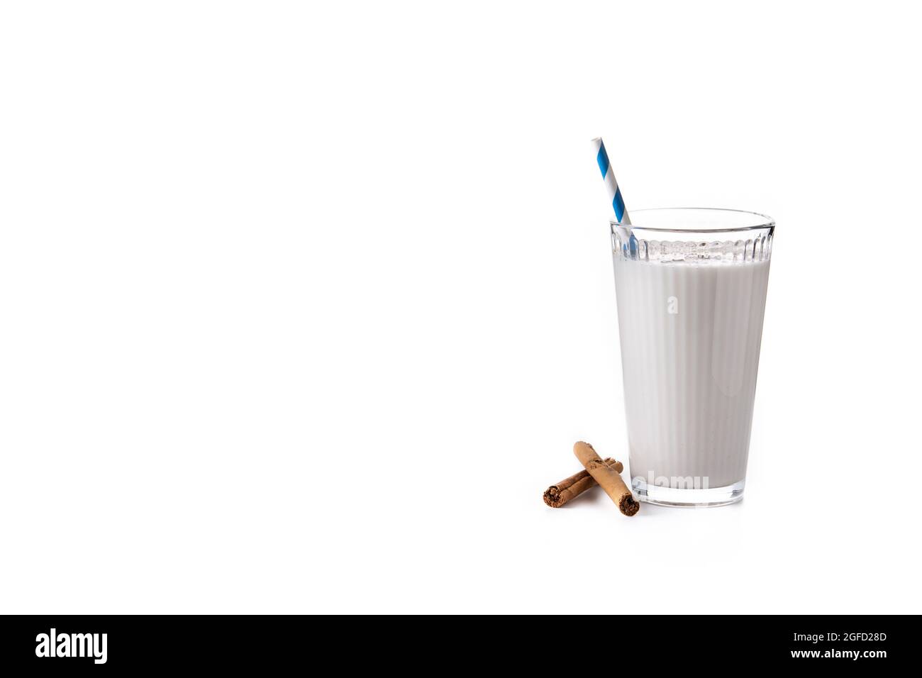 Fresh horchata with cinnamon in glass isolated on white background ...