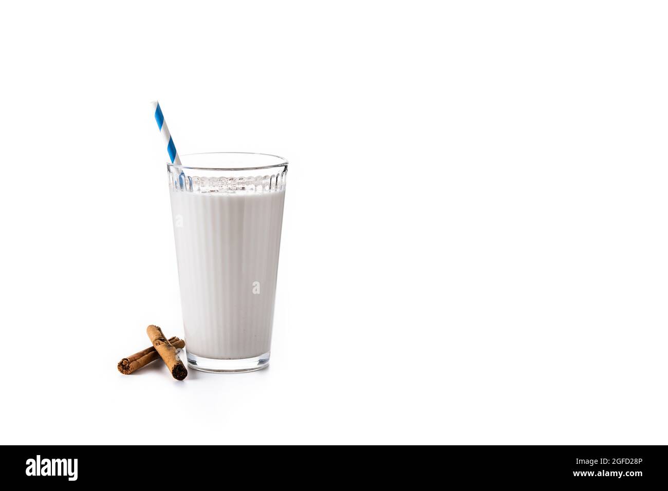 Fresh horchata with cinnamon in glass isolated on white background ...