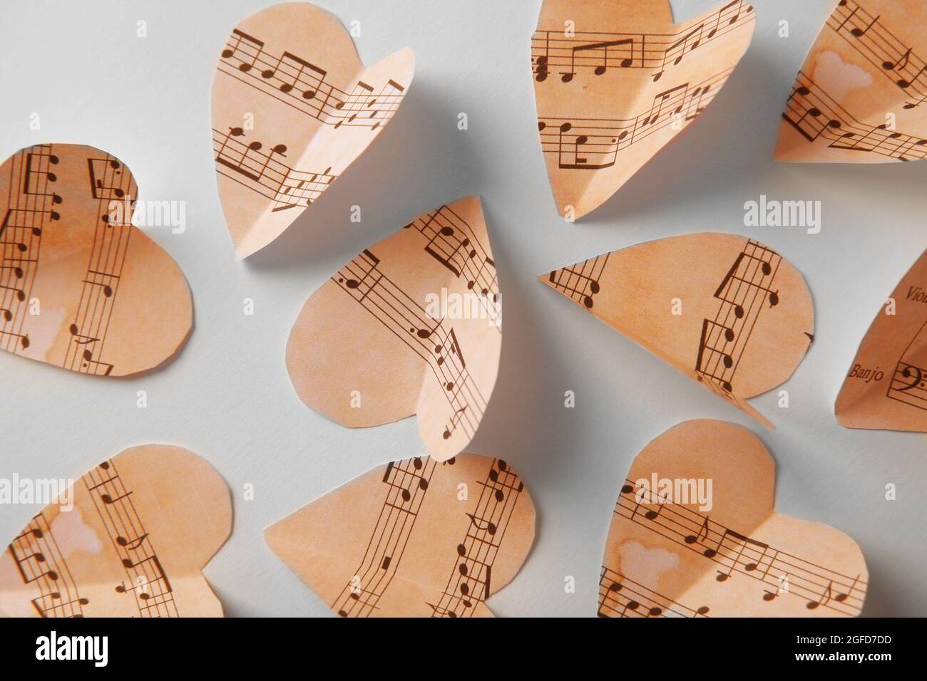Paper hearts with music notes on white background Stock Photo - Alamy