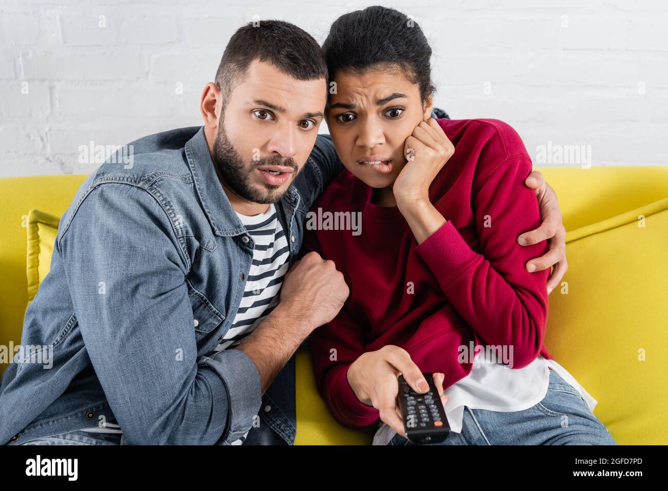 Couple scared hugging hi-res stock photography and images - Alamy