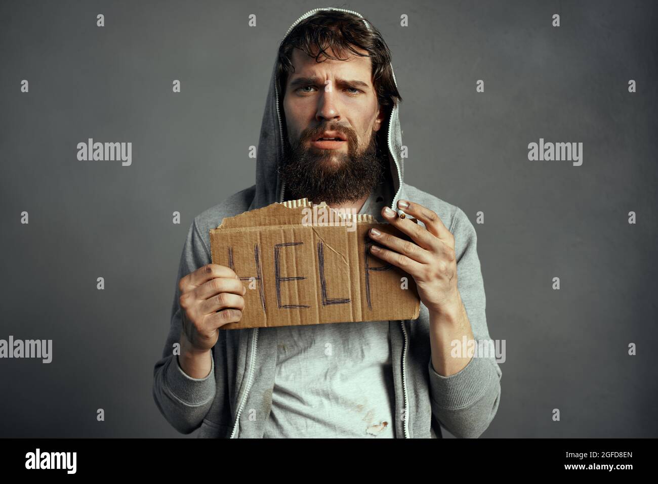 Homeless black man cigarette hi-res stock photography and images - Alamy