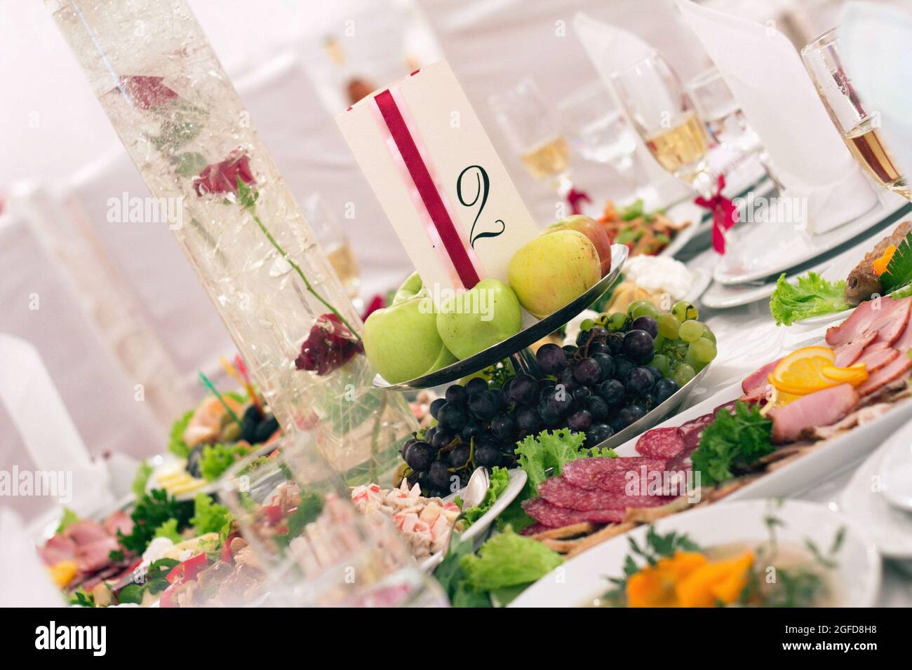 Beautifully covered banquet table with food Stock Photo - Alamy